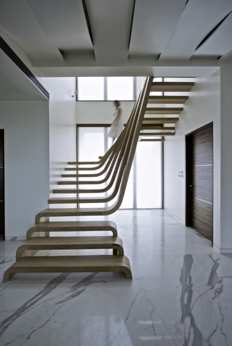 Cascading Staircase is Like an Indoor Frozen Waterfall - Fine & Home